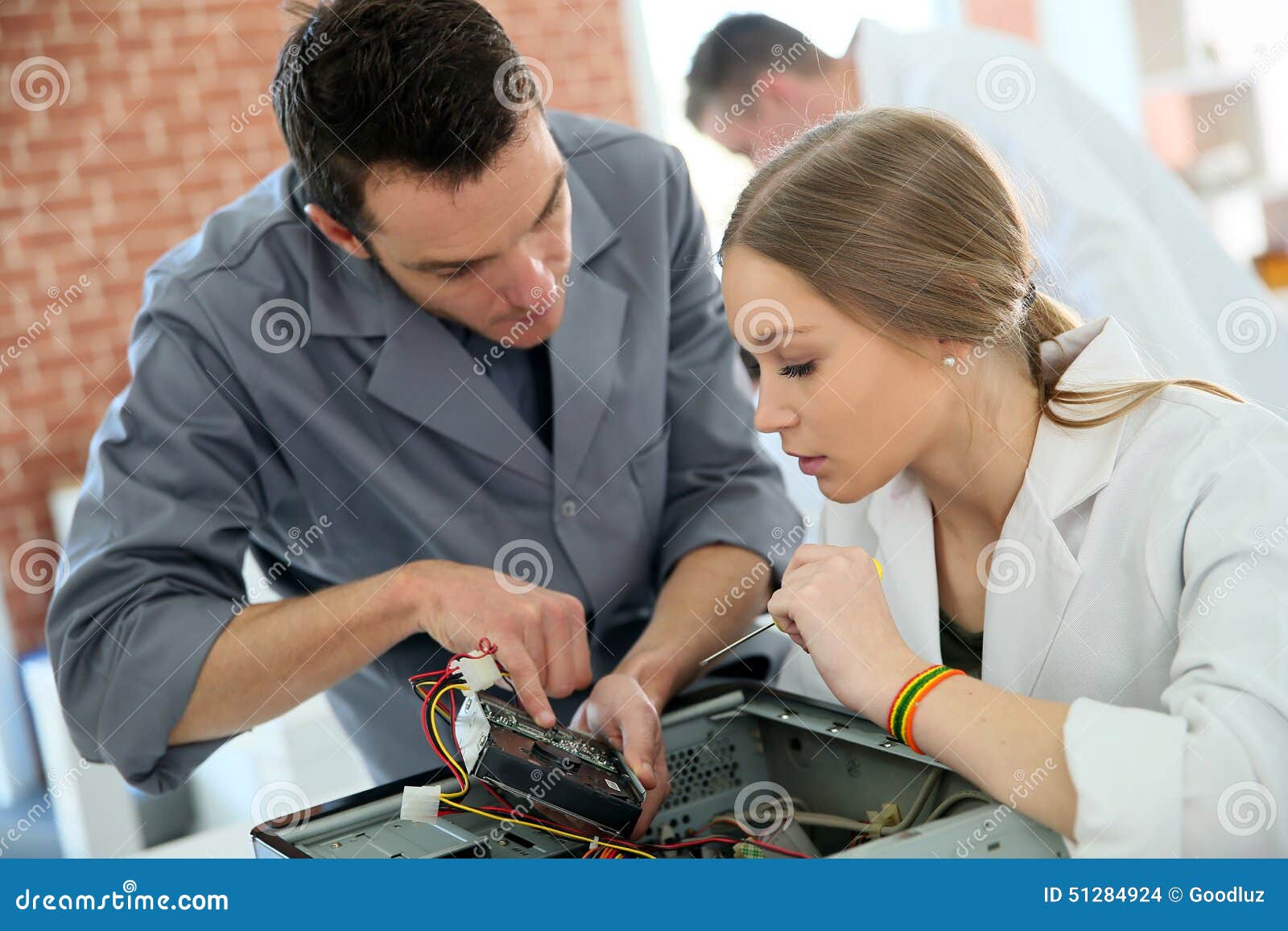 Professor Teaching Young Students Basics of Hardware Stock Photo ...