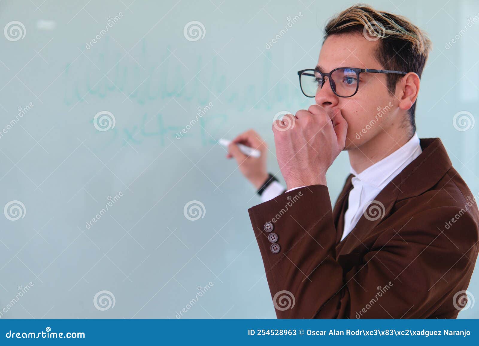 Professor Thinking in Front of the Whiteboard. Teacher in the Middle of ...