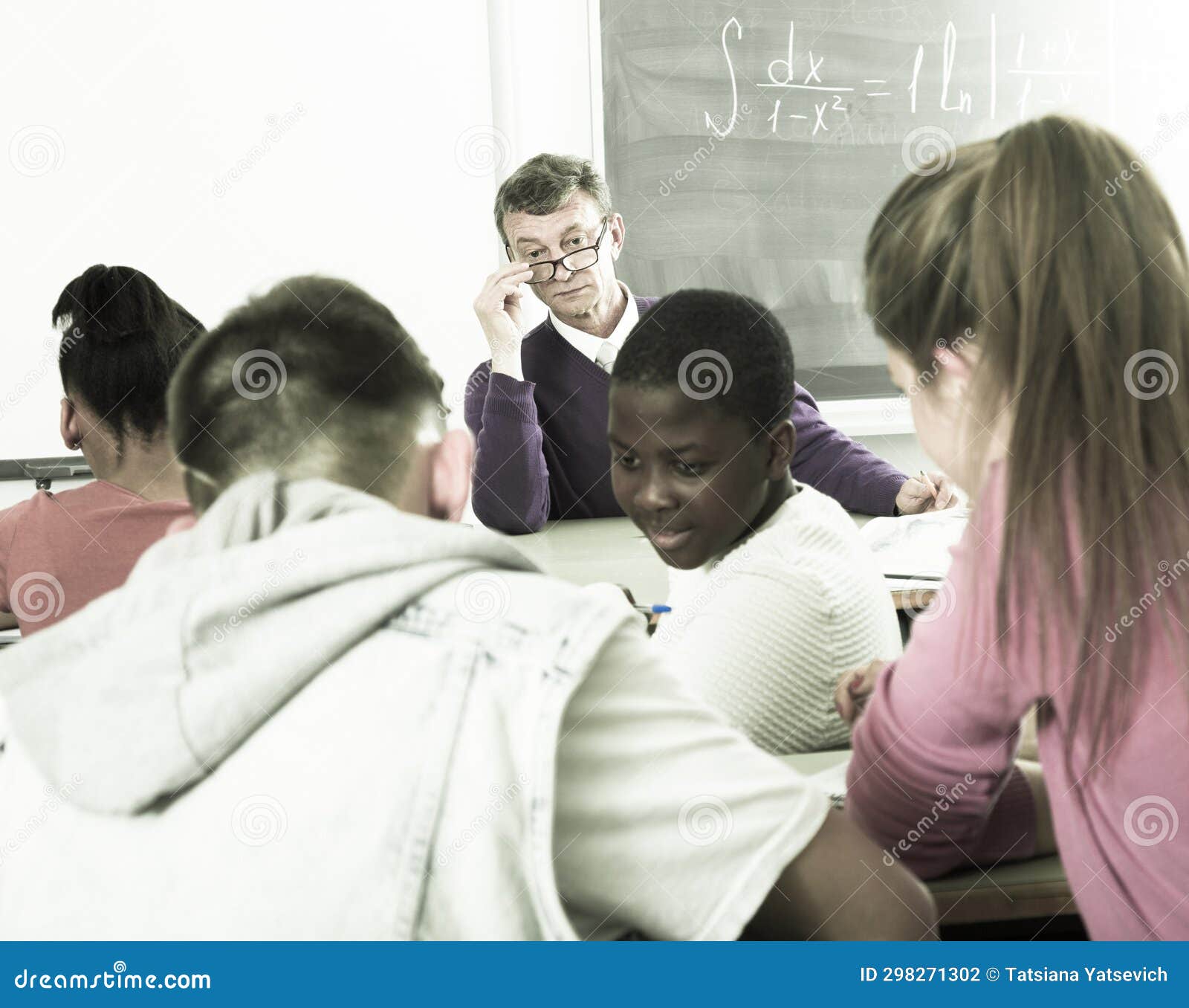 Professor Watching As Student Write Off on Exams Stock Photo - Image of ...