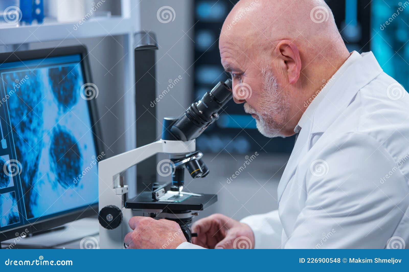 Professor Works in a Modern Scientific Laboratory Using Equipment and ...