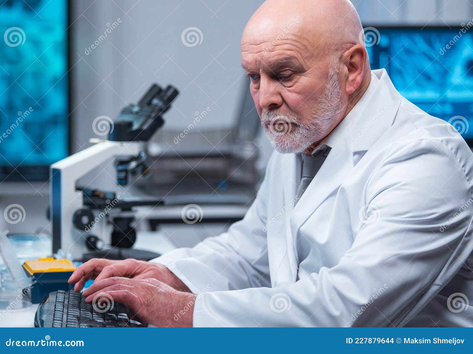 Professor Works in a Modern Scientific Laboratory Using Equipment and ...