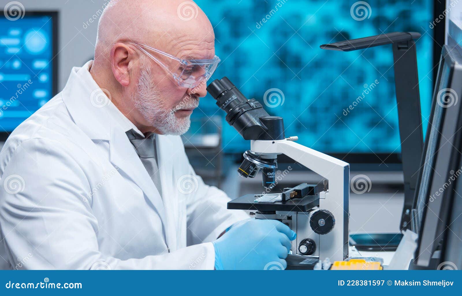 Professor Works in a Modern Scientific Laboratory Using Equipment and ...