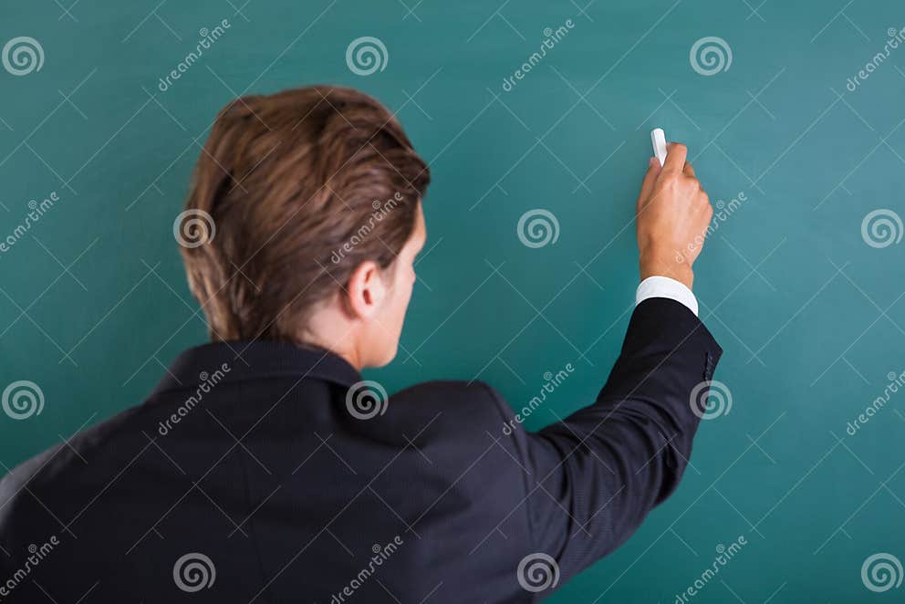 Professor Writing on Chalkboard Stock Photo - Image of intelligent ...