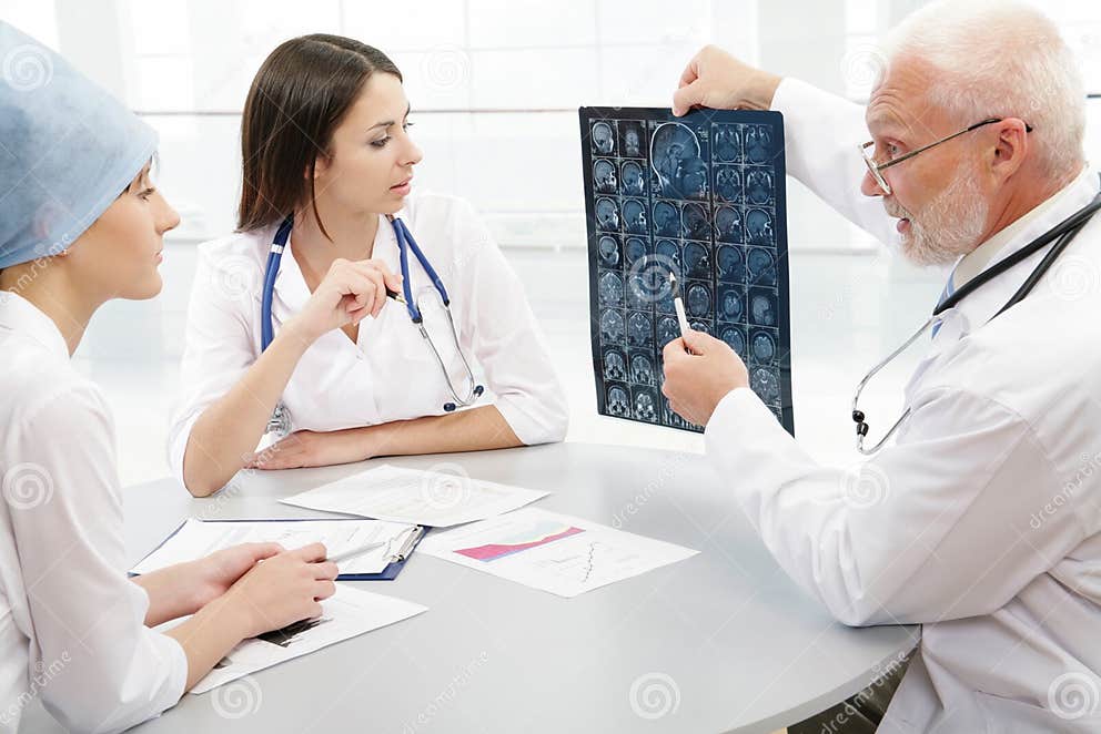 Professor and Young Doctors Stock Image - Image of recovery, medicine ...