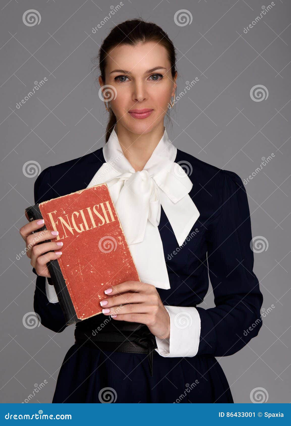 Professore Di Inglese Che Tiene Un Manuale Immagine Stock - Immagine di ...