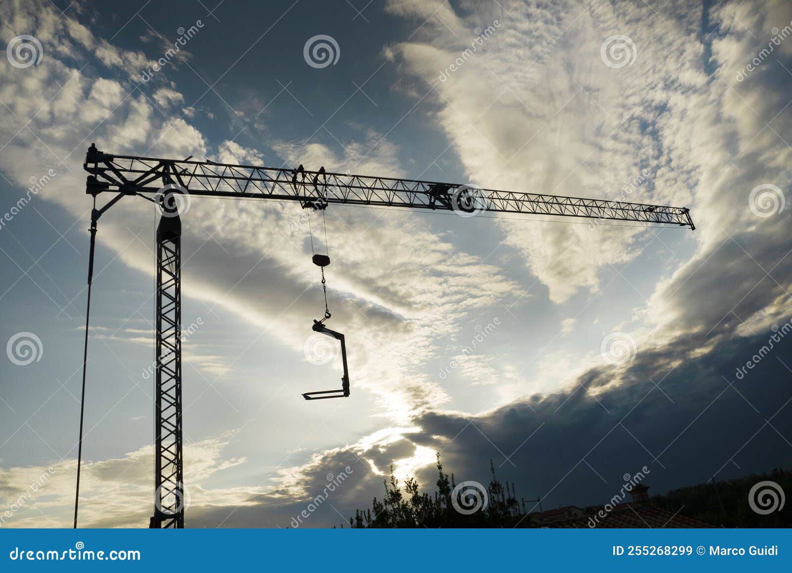 The Profile of a Construction Crane at Sunset Stock Image - Image of ...