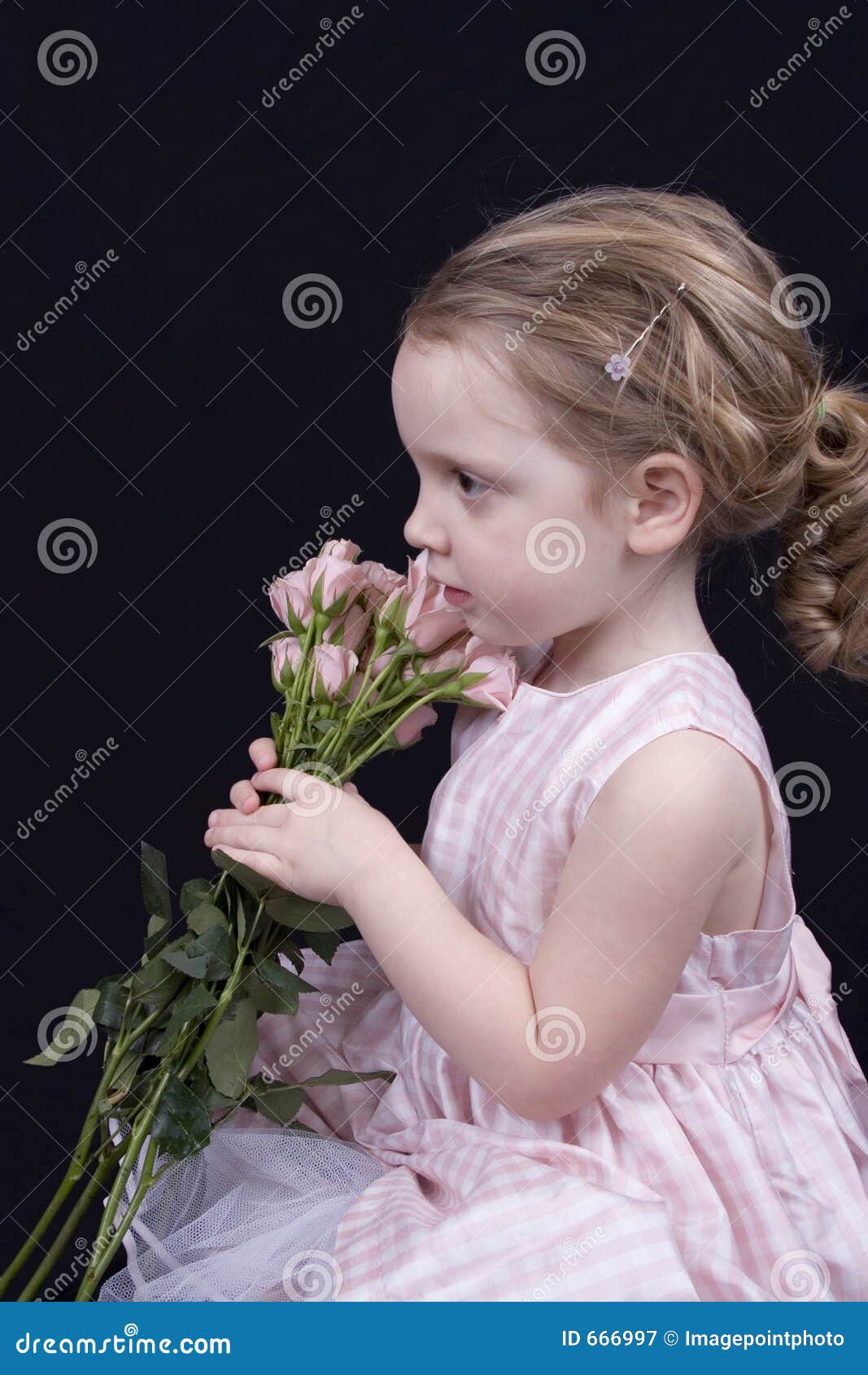 Profile of a little girl stock image. Image of flowers - 666997
