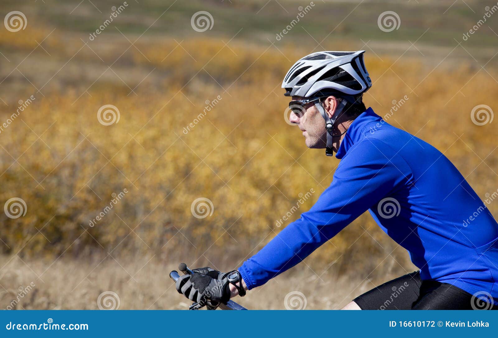 Profile of mountain biker stock photo. Image of male - 16610172