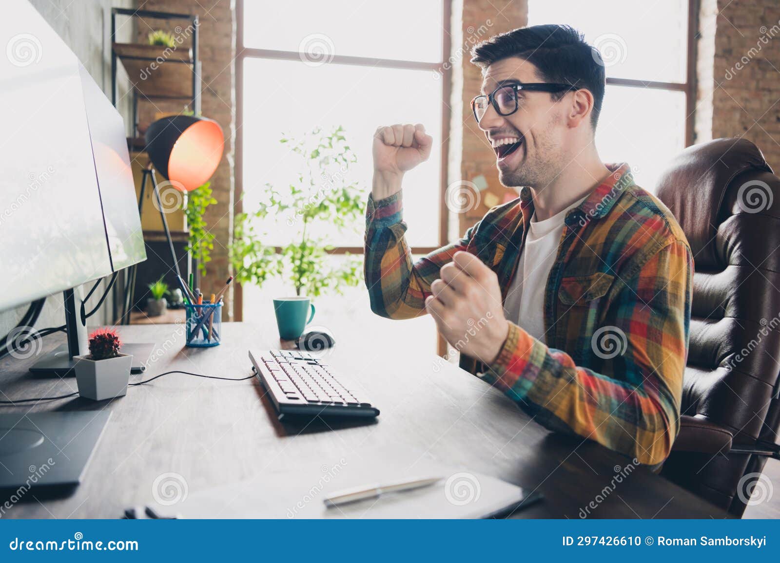 Profile Photo of Delighted Front End Developer Sit Chair Raise Fists ... Profile Photo of Delighted Front End Developer Sit Chair Raise Fists ...