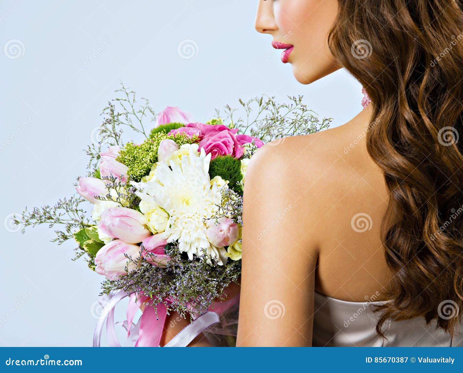 Profile Portrait of a Girl with Flowers in Hands Stock Image - Image of ...