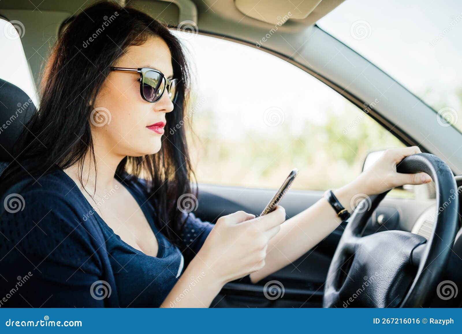 Texting driver stock photo. Image of vehicle, young - 267216016