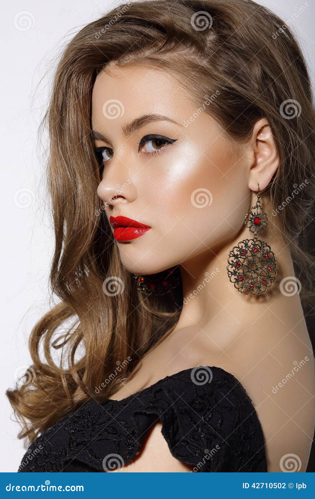 Profile of Respectable Classy Brunette with Earrings Stock Photo ...