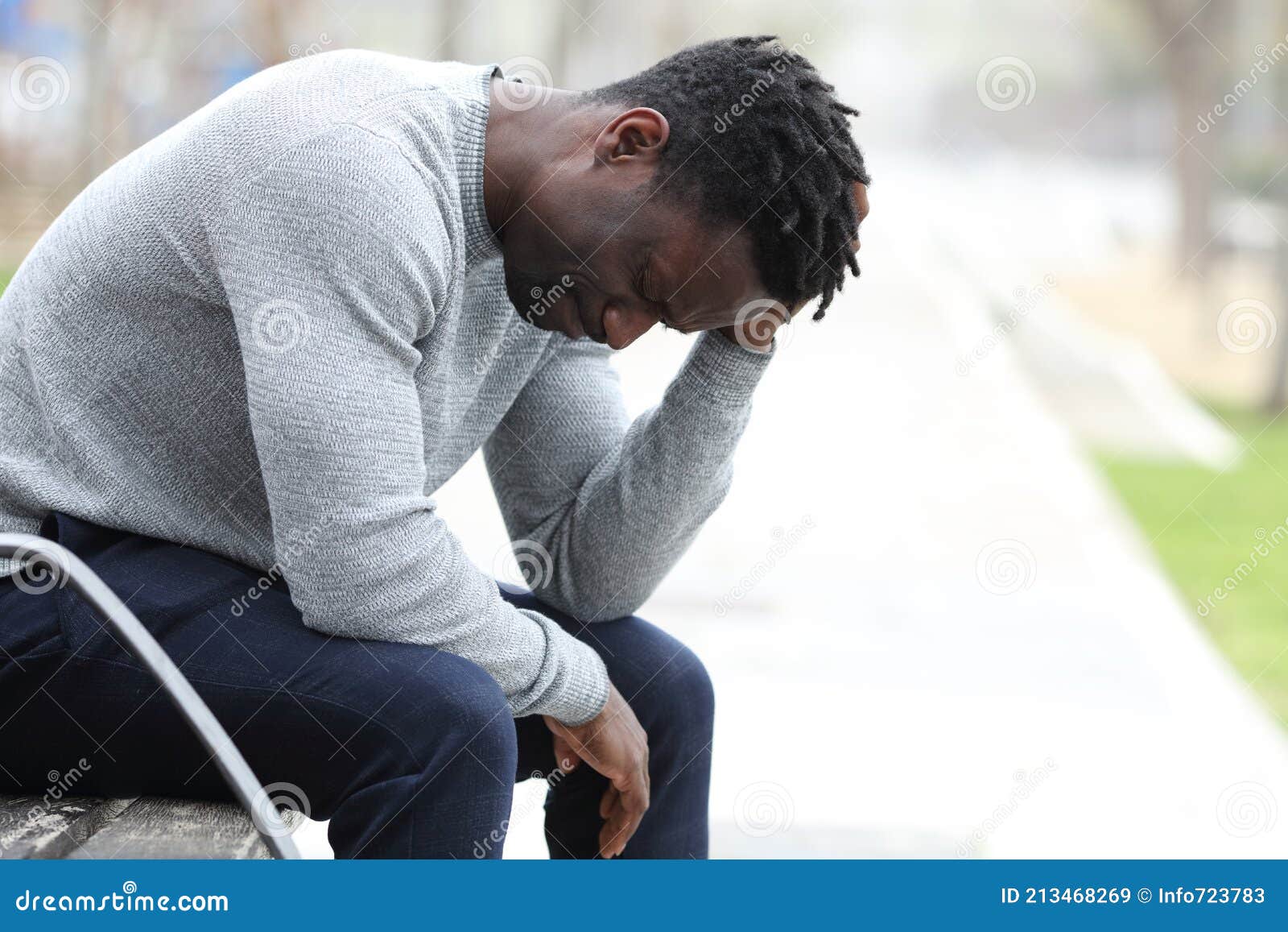 Sad Black Man is Complaining Alone in a Park Stock Image - Image of ... Sad Black Man is Complaining Alone in a Park Stock Image - Image of ...