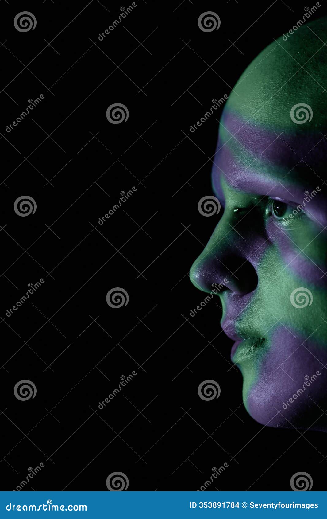 Profile of Sad Man with Blue Projector Light on Face Looking Away in ...