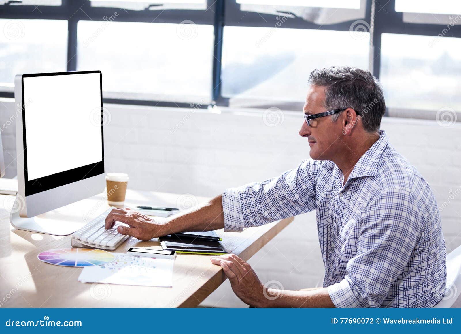 Profile View of Businessman Typing on His Keyboard Stock Photo - Image ...
