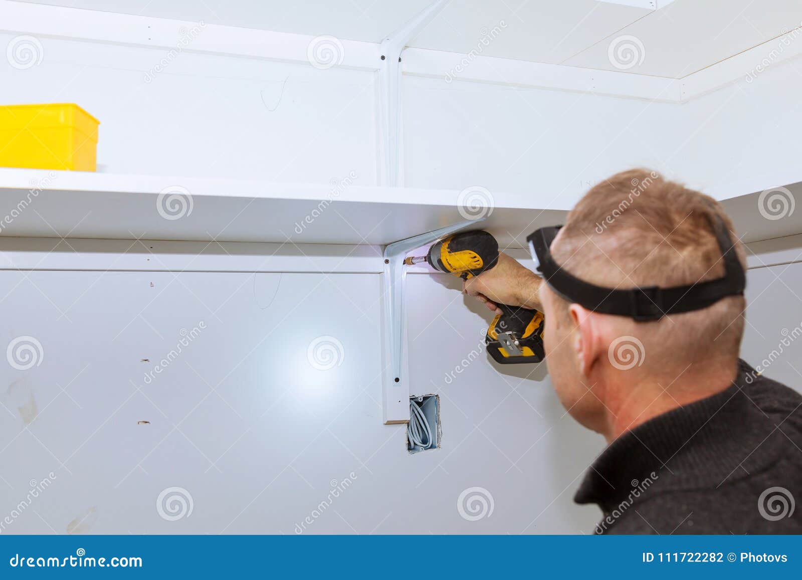Profile View of a Good Looking Handyman Making Some Drill Wall ...