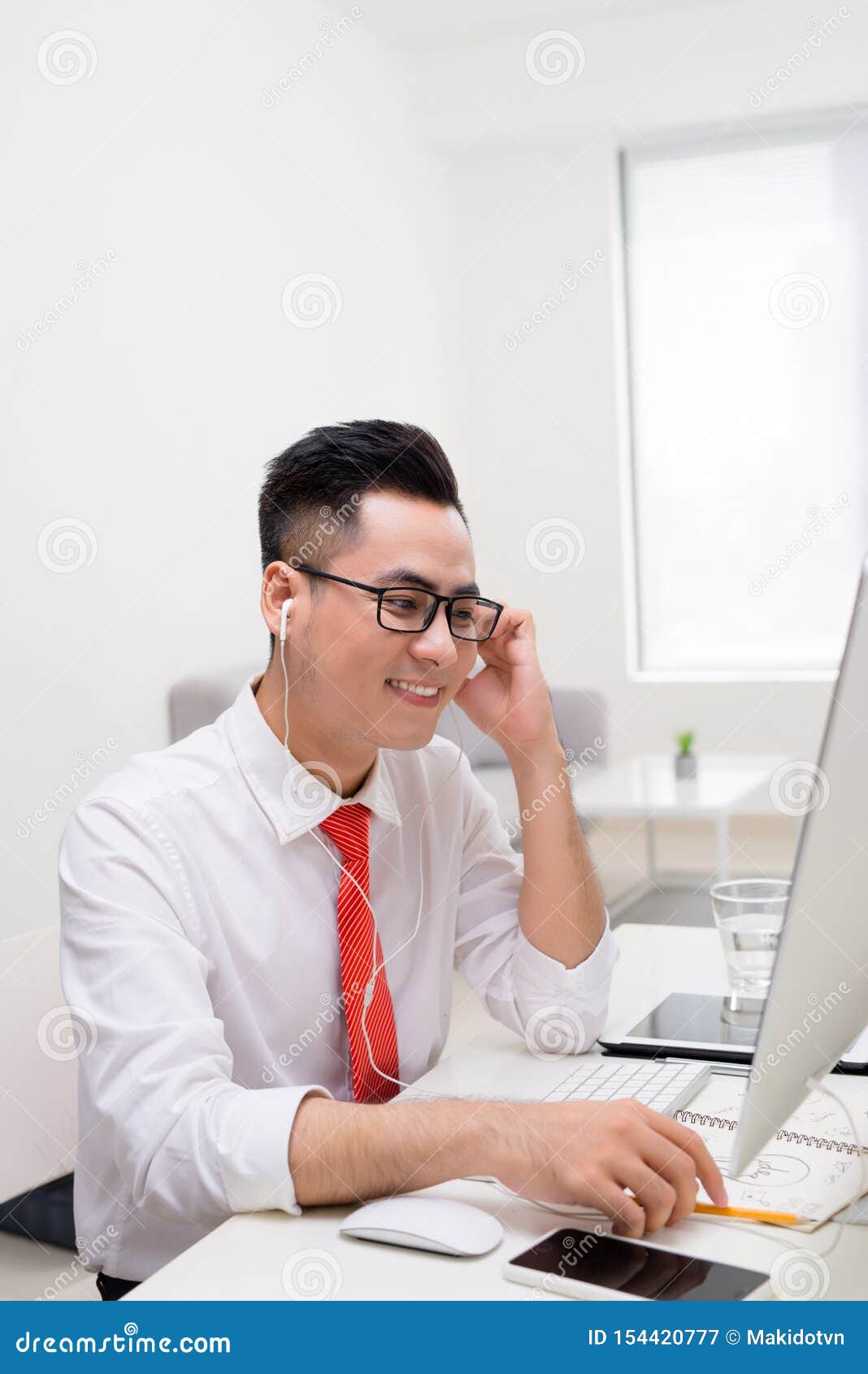 Profile View of a Handsome Young Man Doing Some Meditation Exercises ...