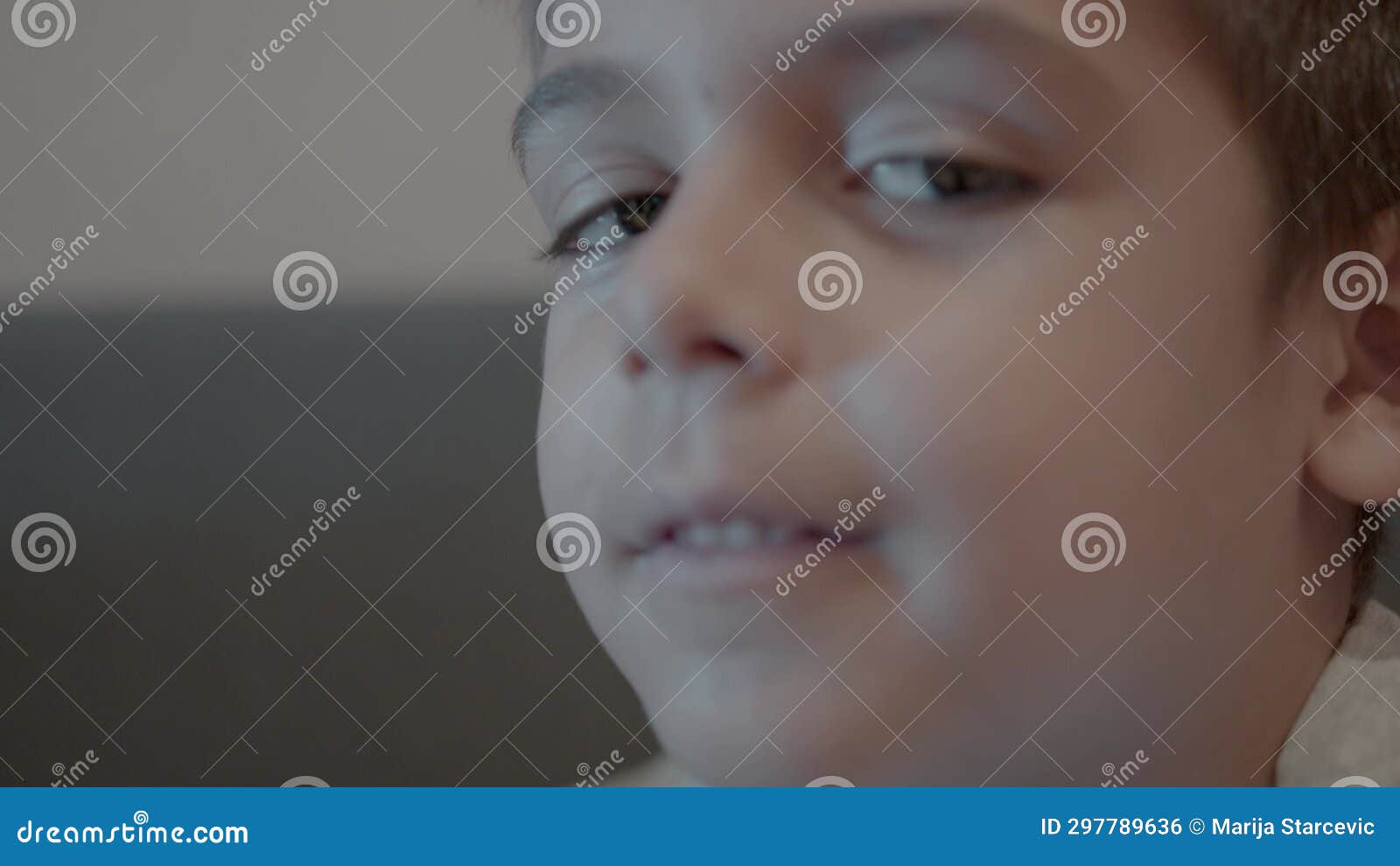 Profile View of the Kid with Mischievous Facial Expression, Turning ...