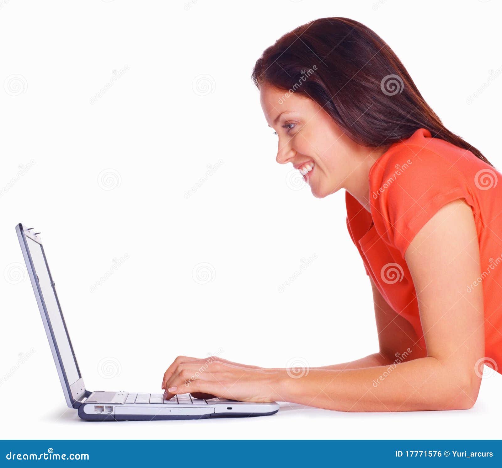 Profile View of a Smiling Woman Using a Laptop Stock Photo - Image of ...