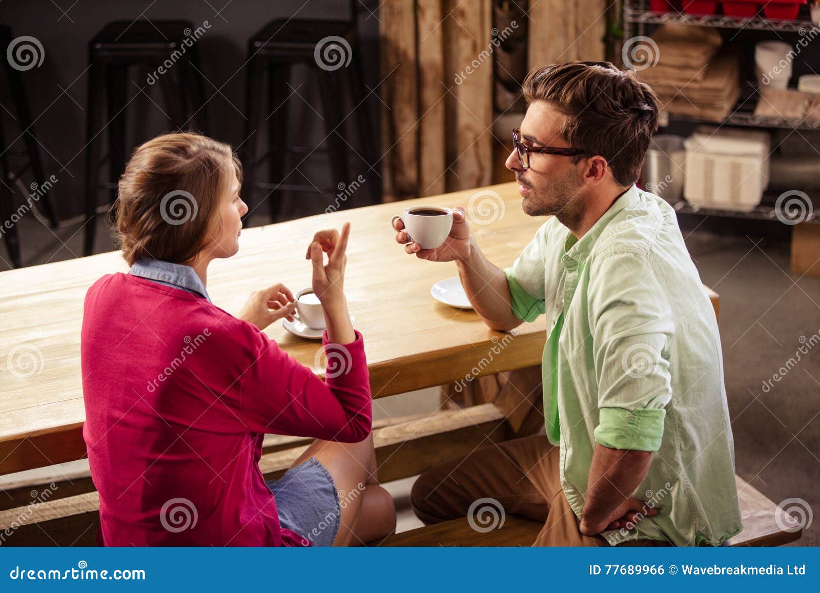 Profile View of Two Friends Drinking Coffee Stock Photo - Image of ...