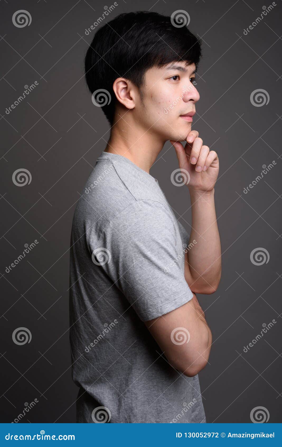 Profile View of Young Handsome Asian Man Thinking Stock Photo - Image ...