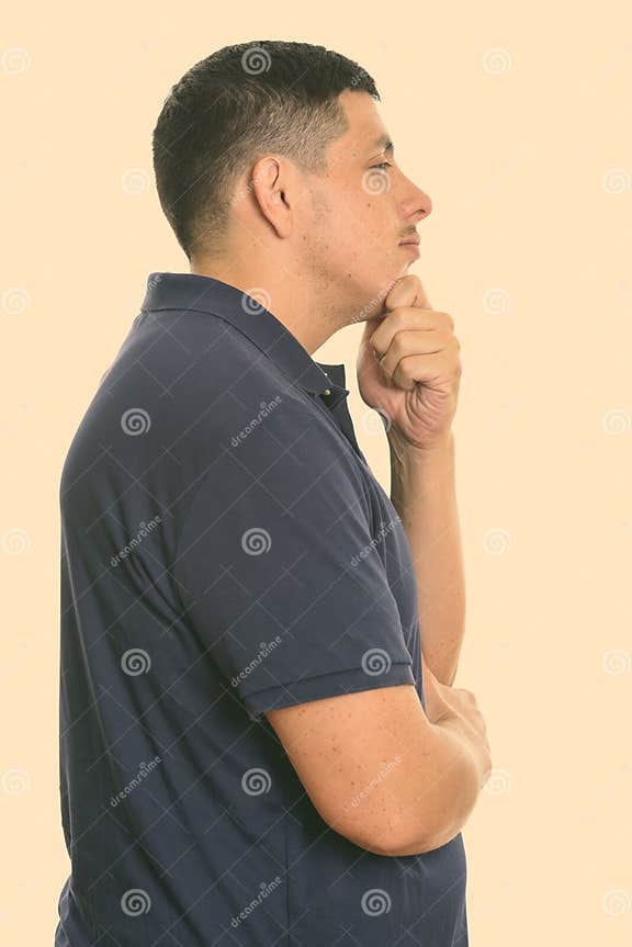 Profile View of Young Hispanic Man Thinking Studio Shot Stock Image ...
