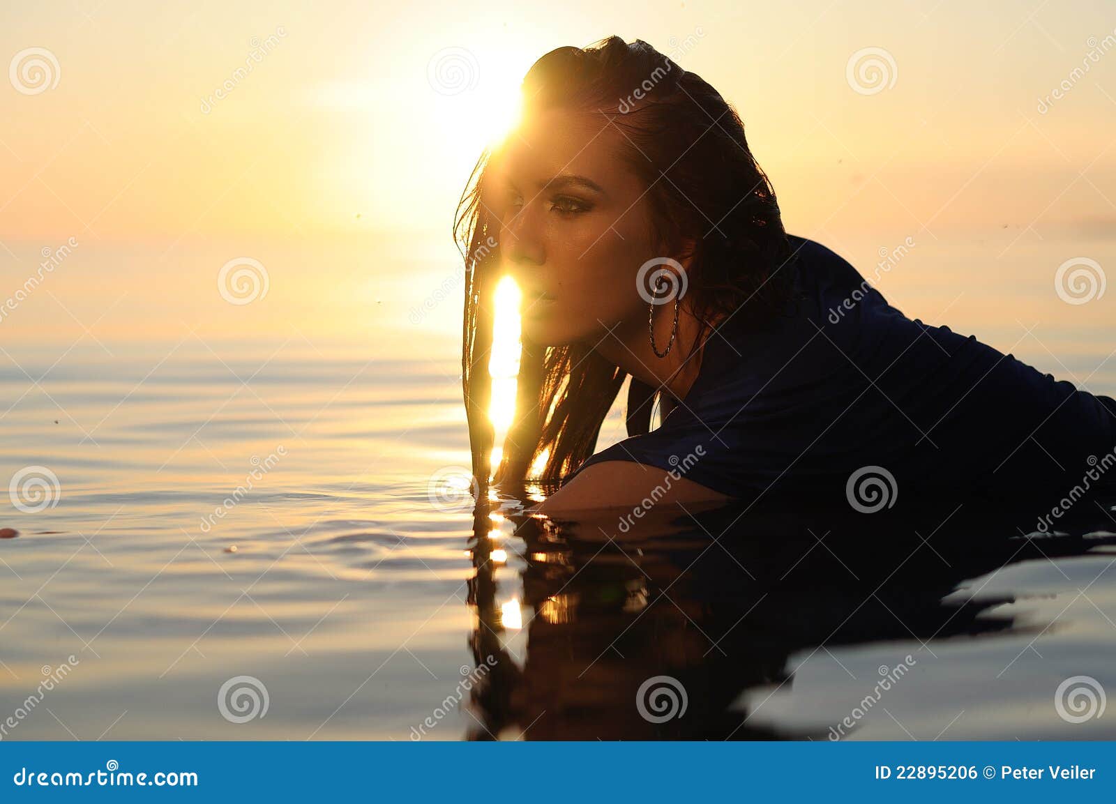 Profile of Woman in Dramatic Sunset Stock Photo - Image of beautiful ...