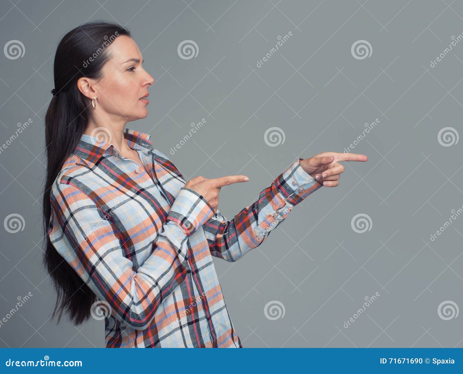 Profile of a Woman Pointing Finger at Side Stock Photo - Image of hand ...