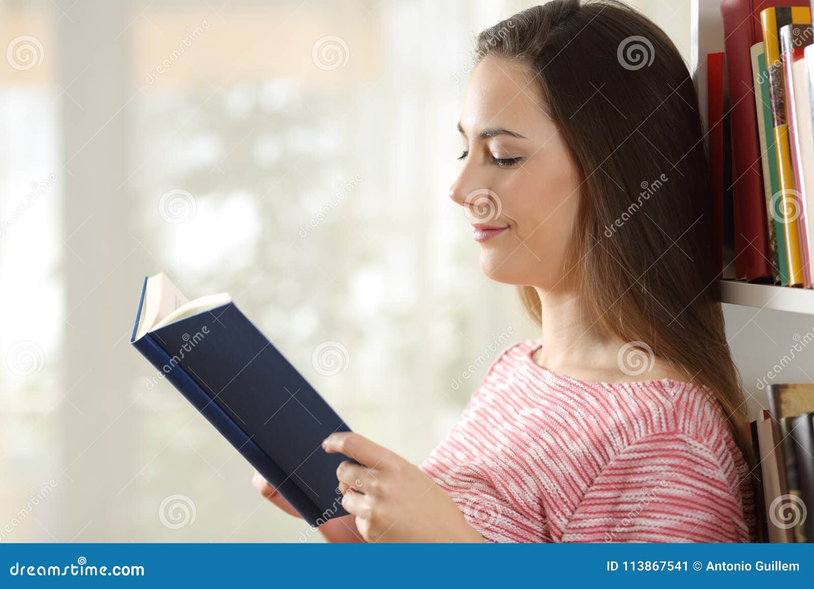 Profile of a Woman Reading a Book at Home Stock Image - Image of home ...