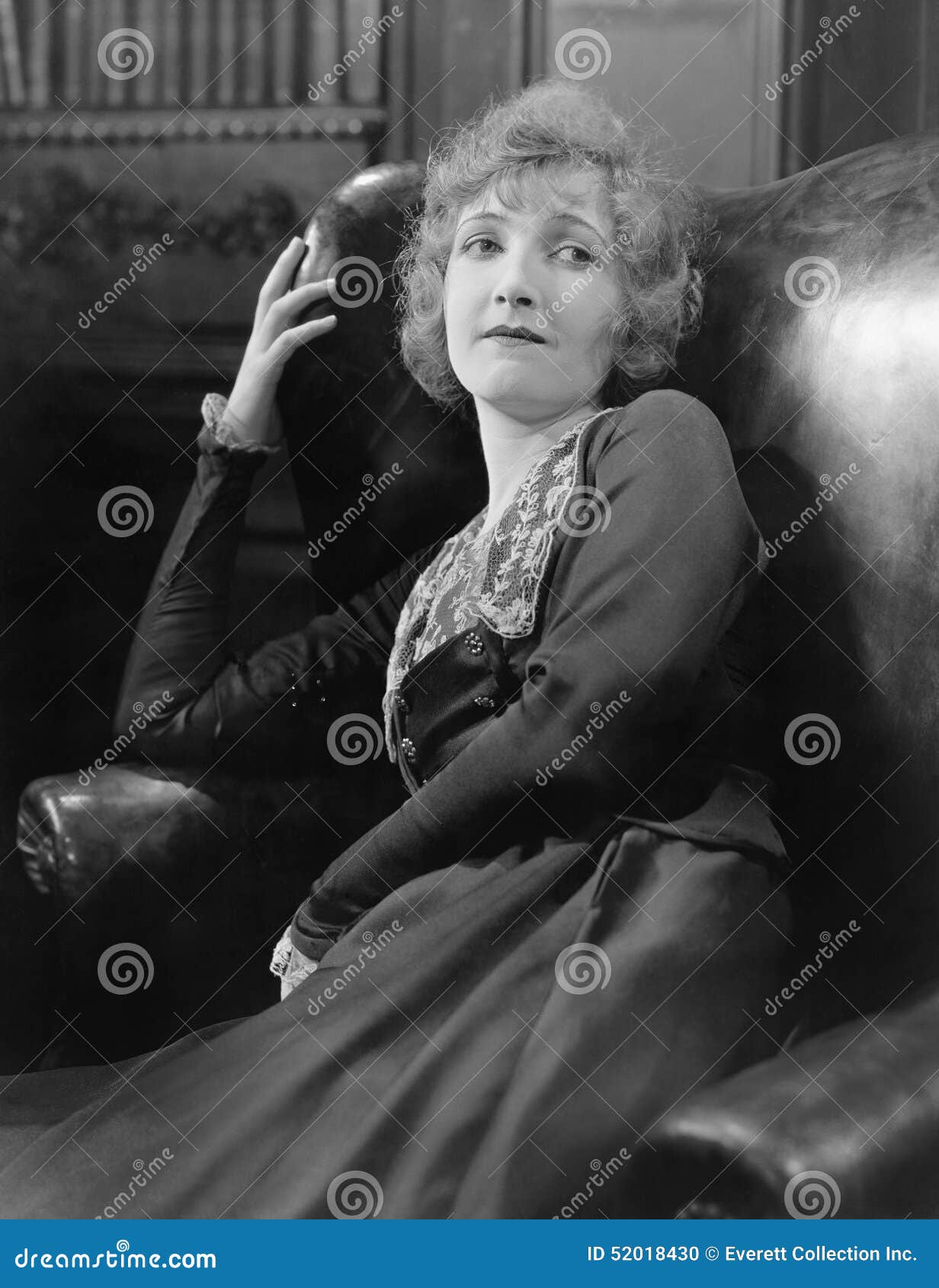 Profile of a Woman Sitting in an Armchair Stock Photo - Image of ...