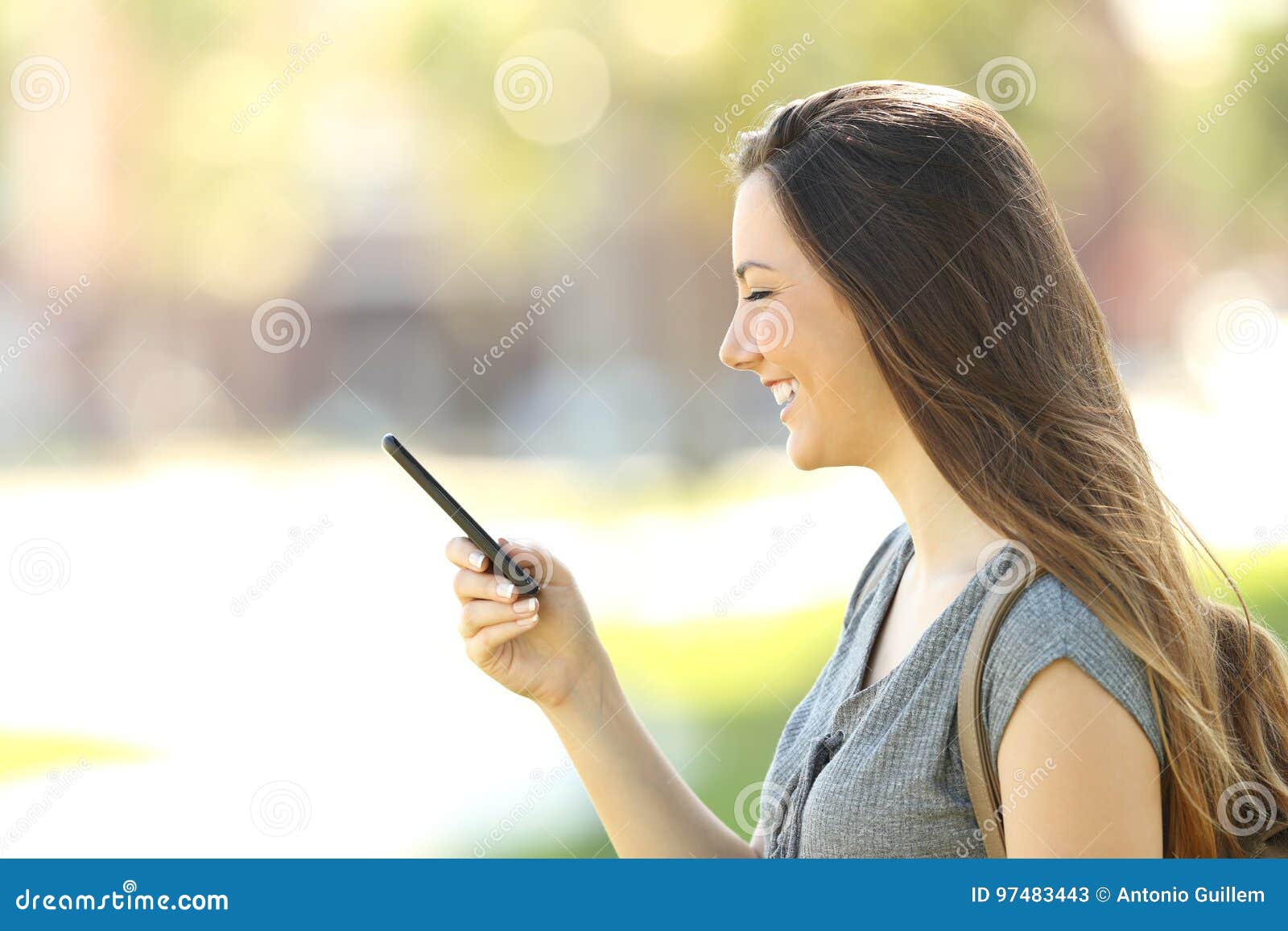Profile of a Woman Using a Mobile Phone Stock Image - Image of city ...