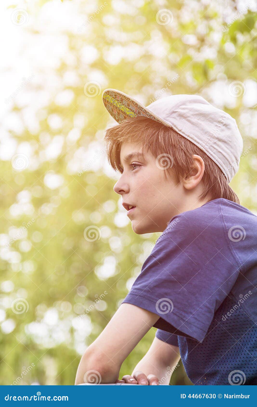 Profile of a Young Boy with Base Cap Stock Photo - Image of blue, color ...