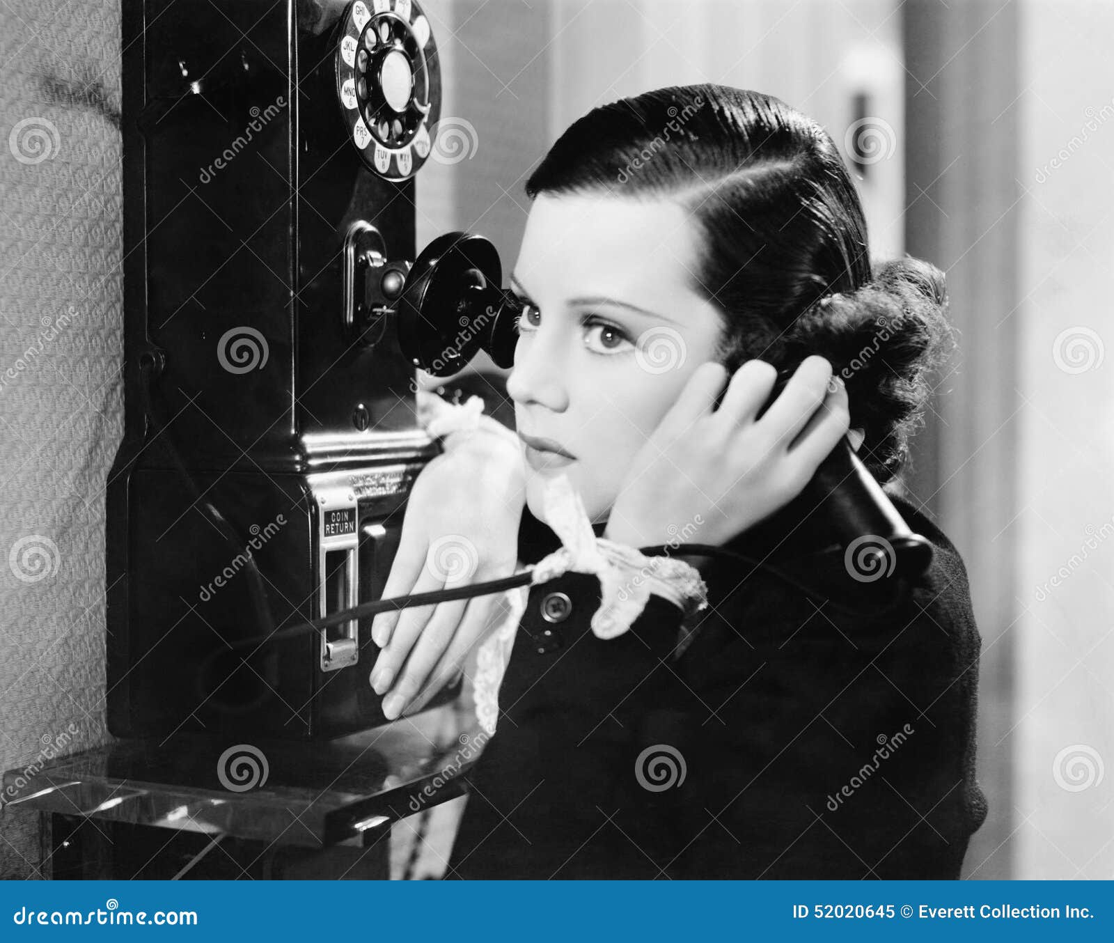 Profile of a Young Woman Talking on a Payphone Stock Image - Image of ...