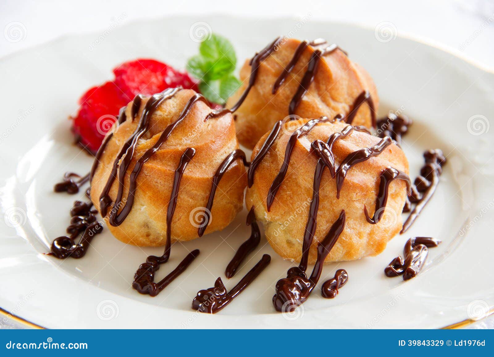 Profiteroles with cream stock image. Image of dessert - 39843329