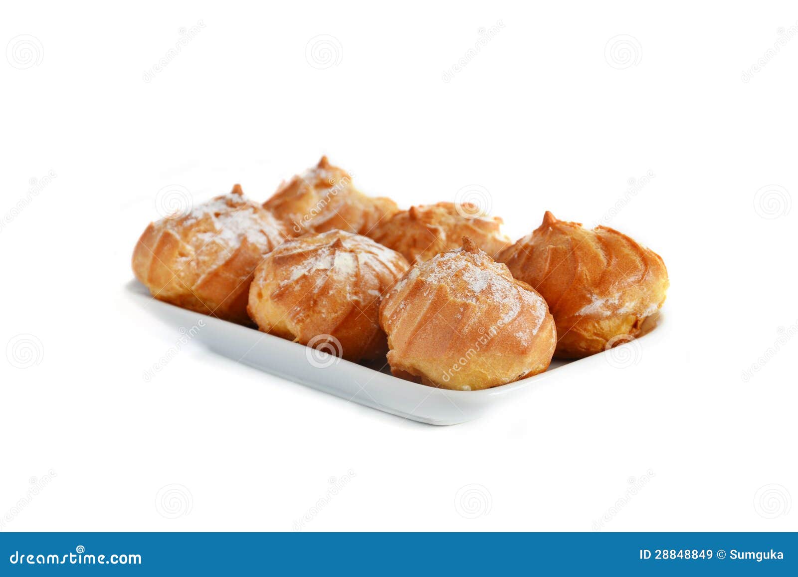 Profiteroles on the plate stock image. Image of bakery - 28848849