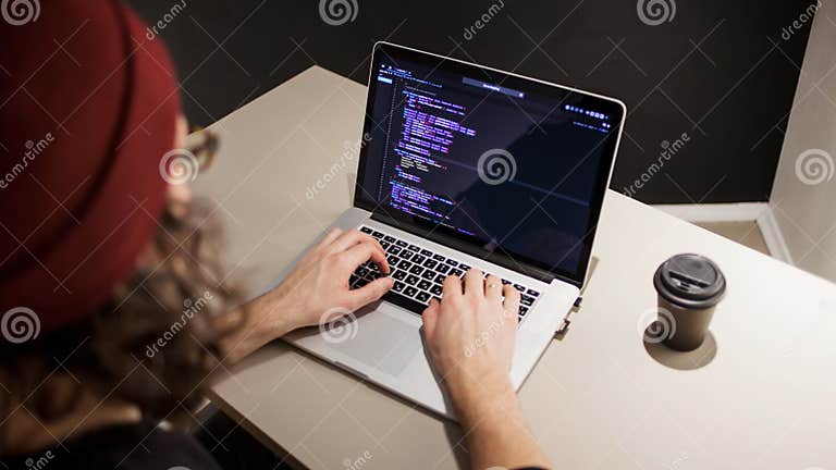 Programmer and Coder Working in the Development Environment. Programmer`s Workplace Stock Photo ...