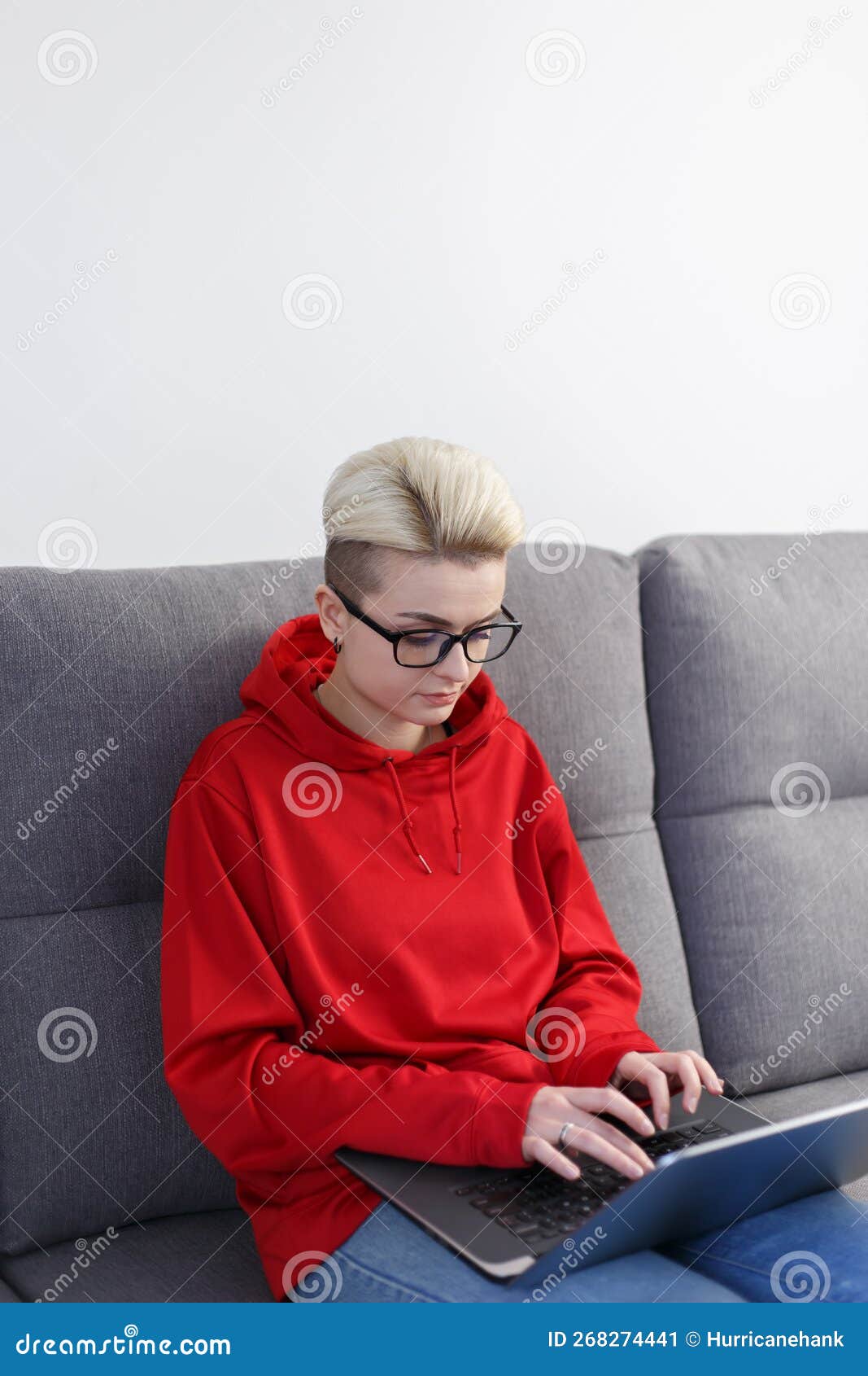 Programmer Coding on Laptop at Home. Short Haired Tom Boy Female Typing ...