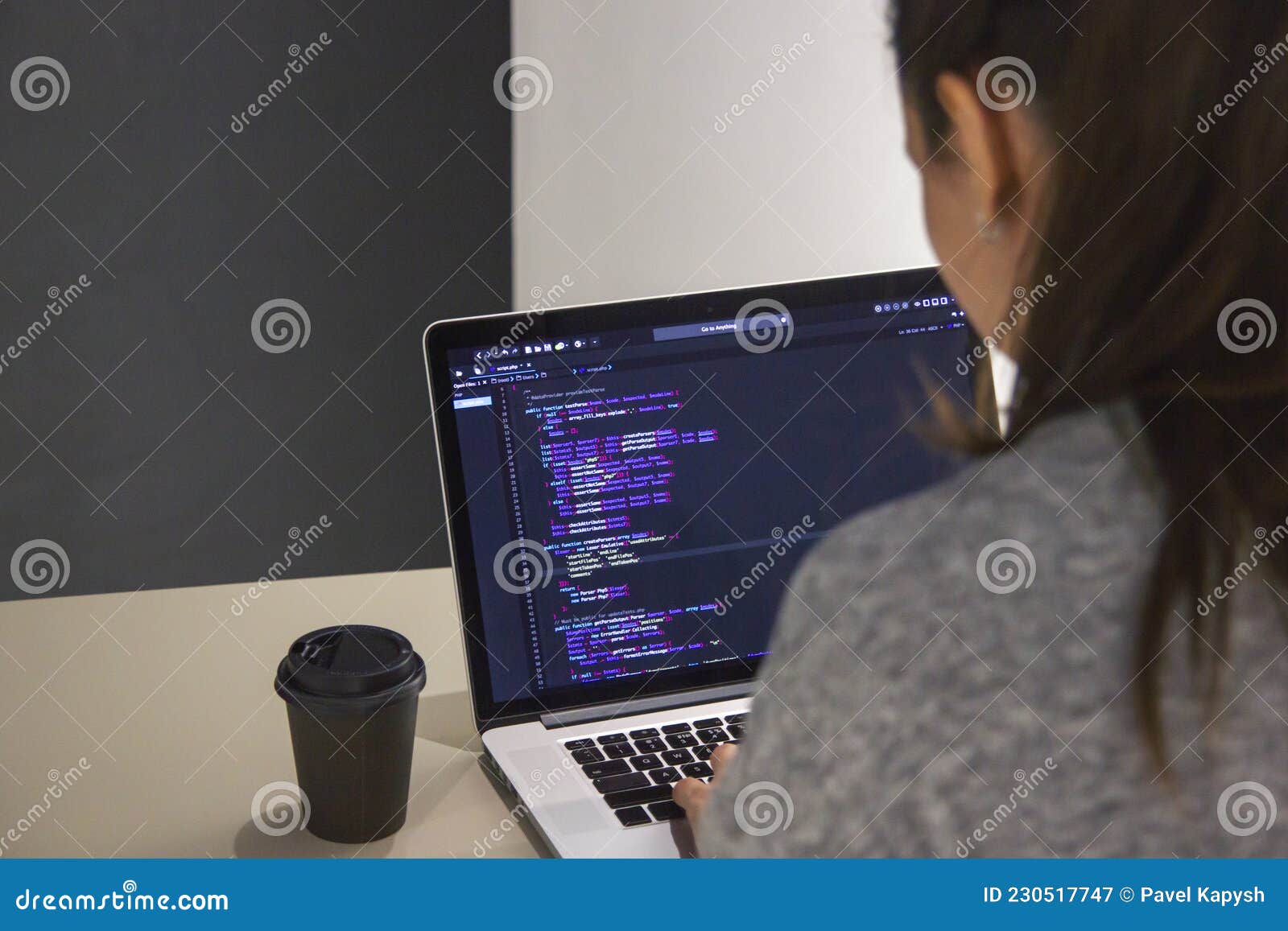 A Programmer Coding on a Laptop in the Workplace Stock Image - Image of ...
