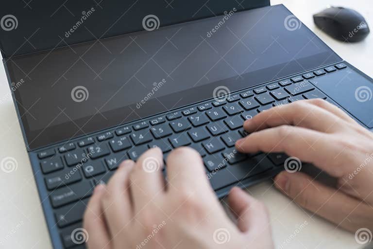 Programmer or Computer Hacker Typing Code on Laptop Keyboard. Keypad is Lit in White Light. Hand ...