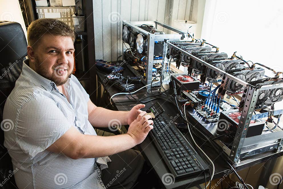 Programmer Configures Hardware for Bitcoin Mining Stock Photo - Image ...