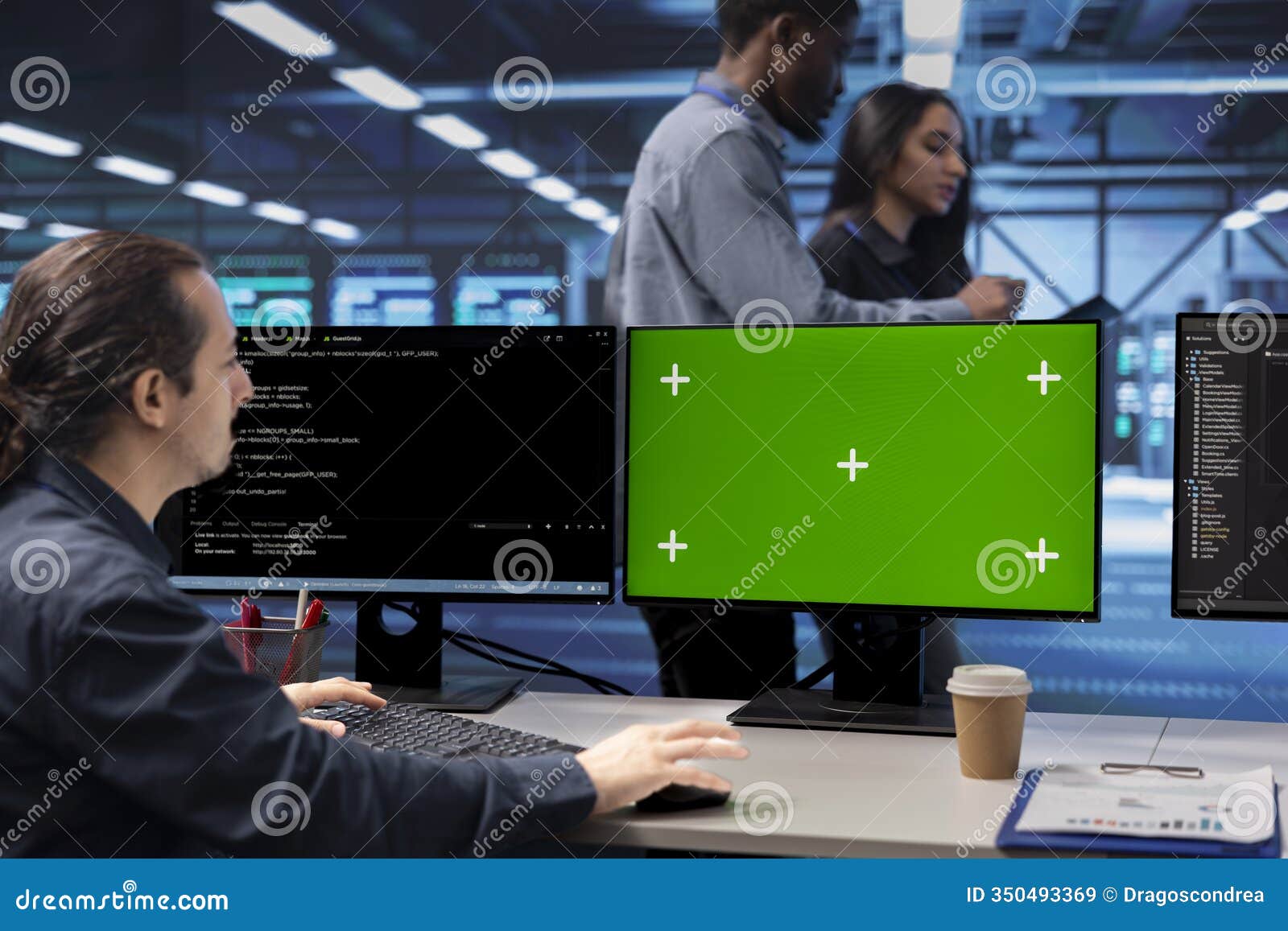 Programmer in Data Center Using Green Screen Computer To Check Server Issues Stock Image - Image ...