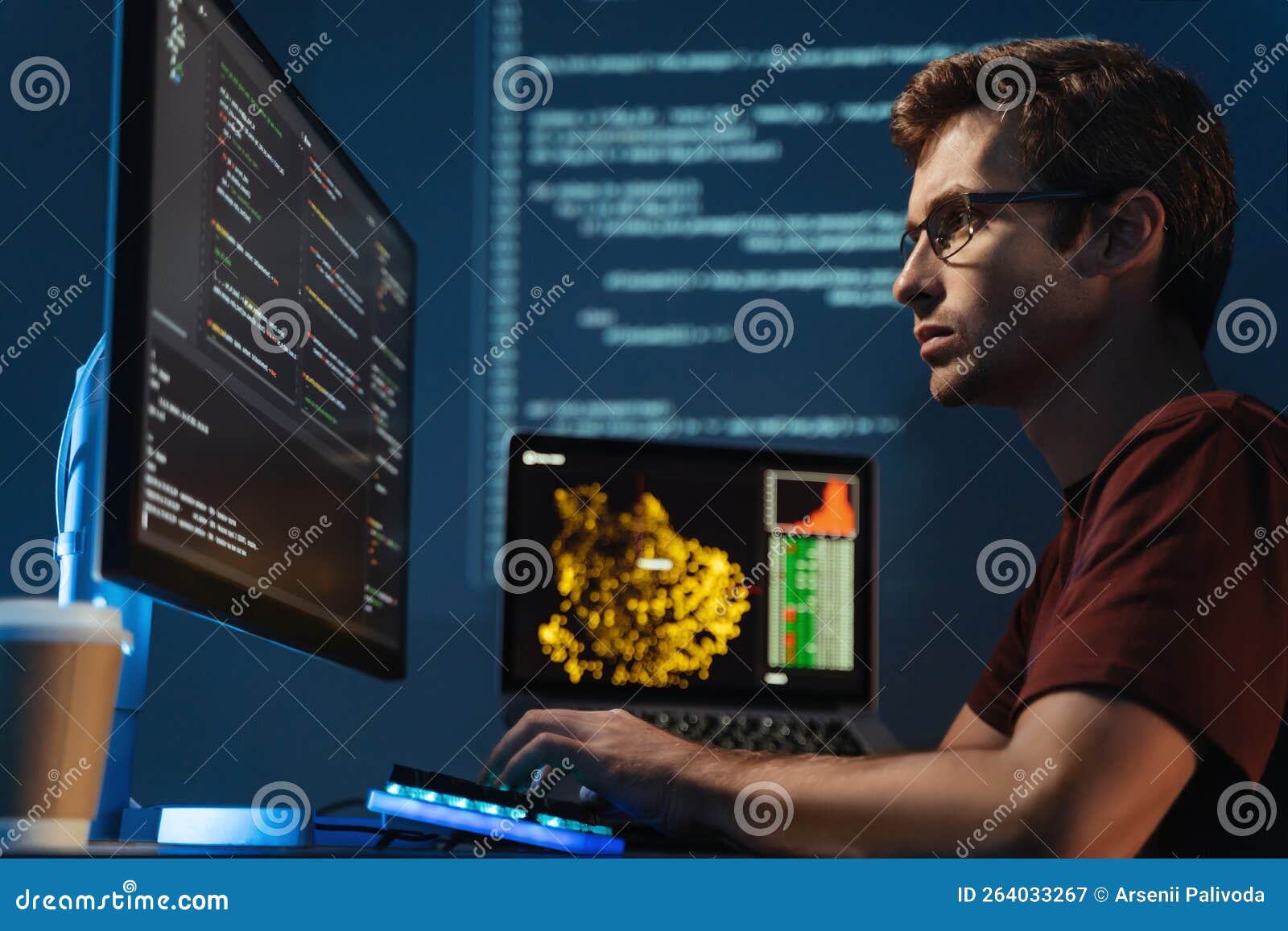 Programmer Man Looking at Big Monitor Checking Id-address and Debugging ...