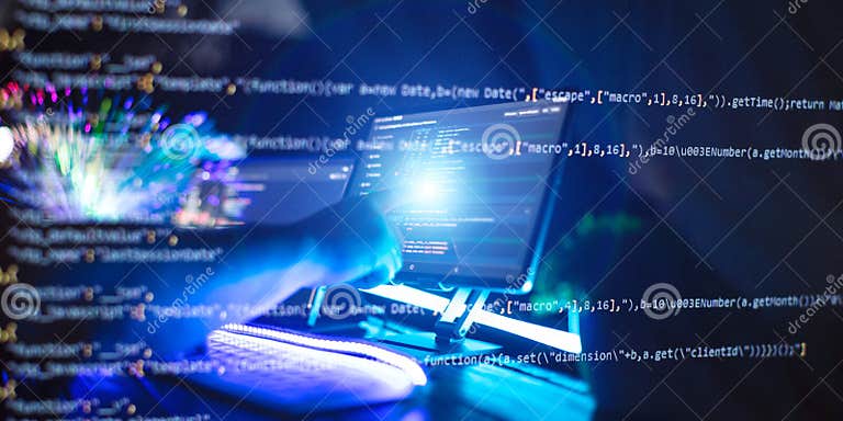 Programmer Manually Working with Program Code on a Computer at Night in ... Programmer Manually Working with Program Code on a Computer at Night in ...