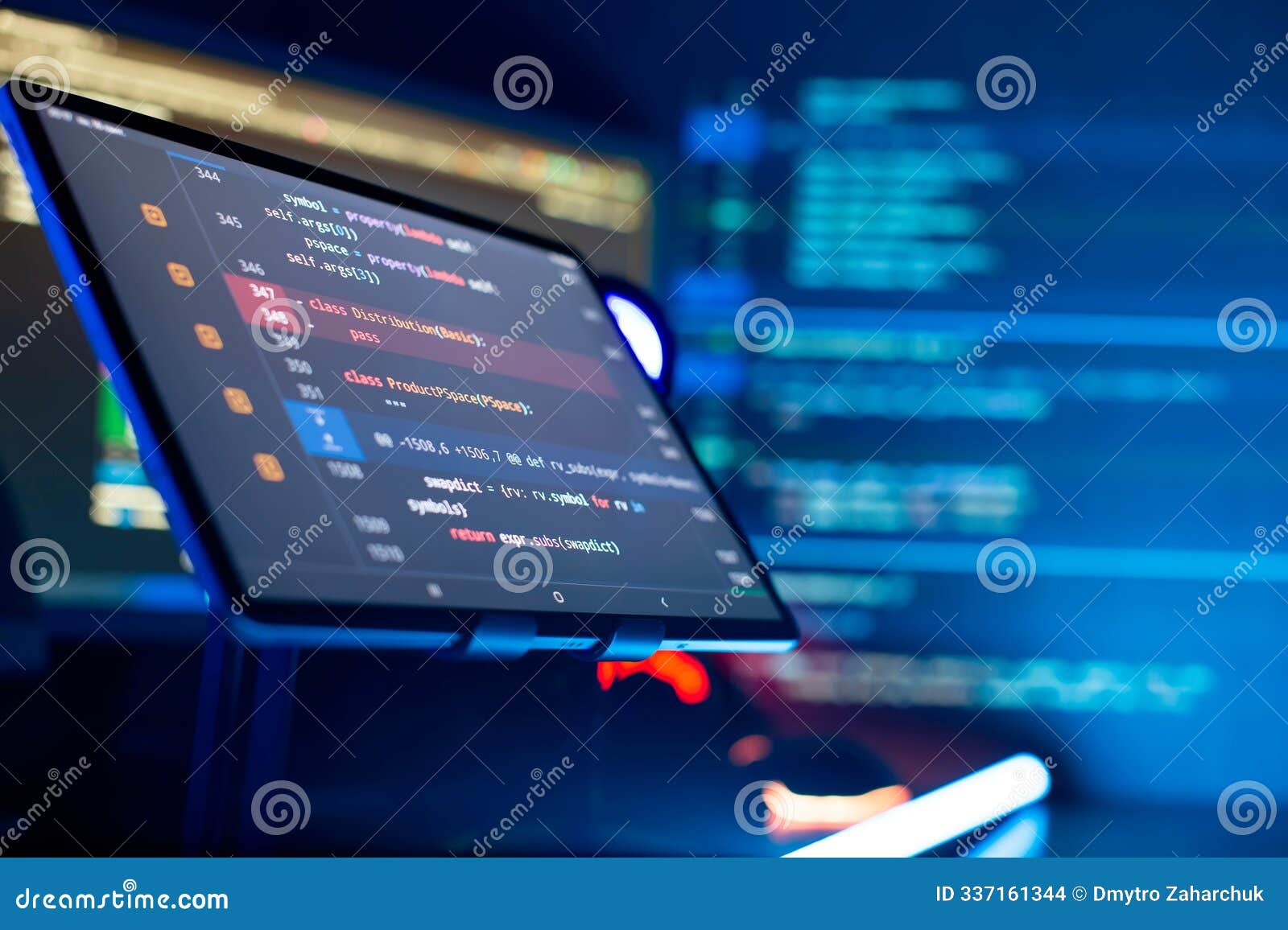 Programmer Manually Working with Program Code on a Computer at Night in ... Programmer Manually Working with Program Code on a Computer at Night in ...