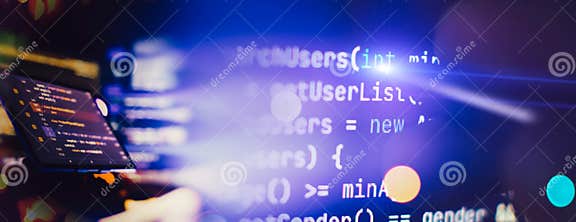 Programmer Manually Working with Program Code on a Computer at Night in ...