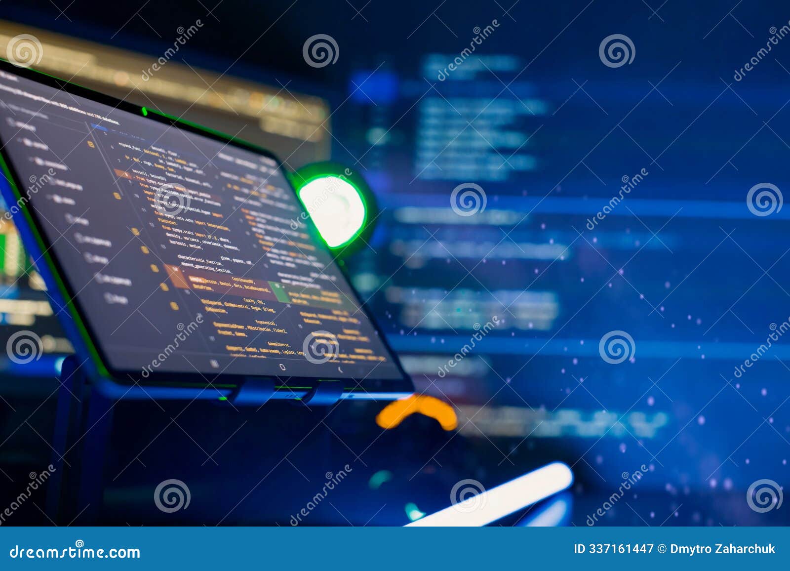 Programmer Manually Working With Program Code On A Computer At Night In A Data Center And