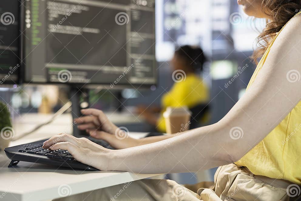 Programmer Typing On Computer Conducting Tests To Optimize Machine Learning Stock Image Image