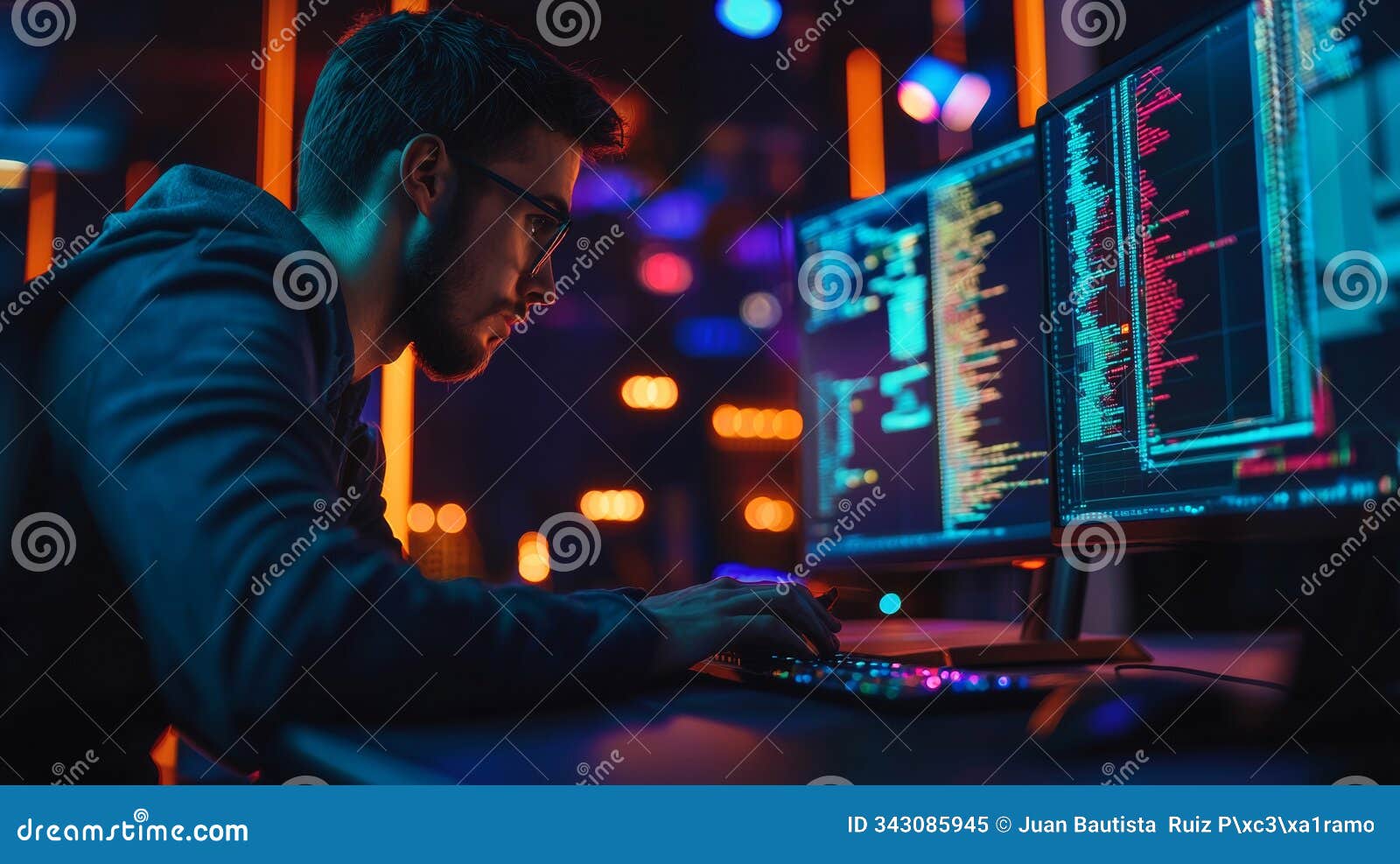 Programmer Working On Code In Dark Office With Neon Lights Stock Image Image Of Computer