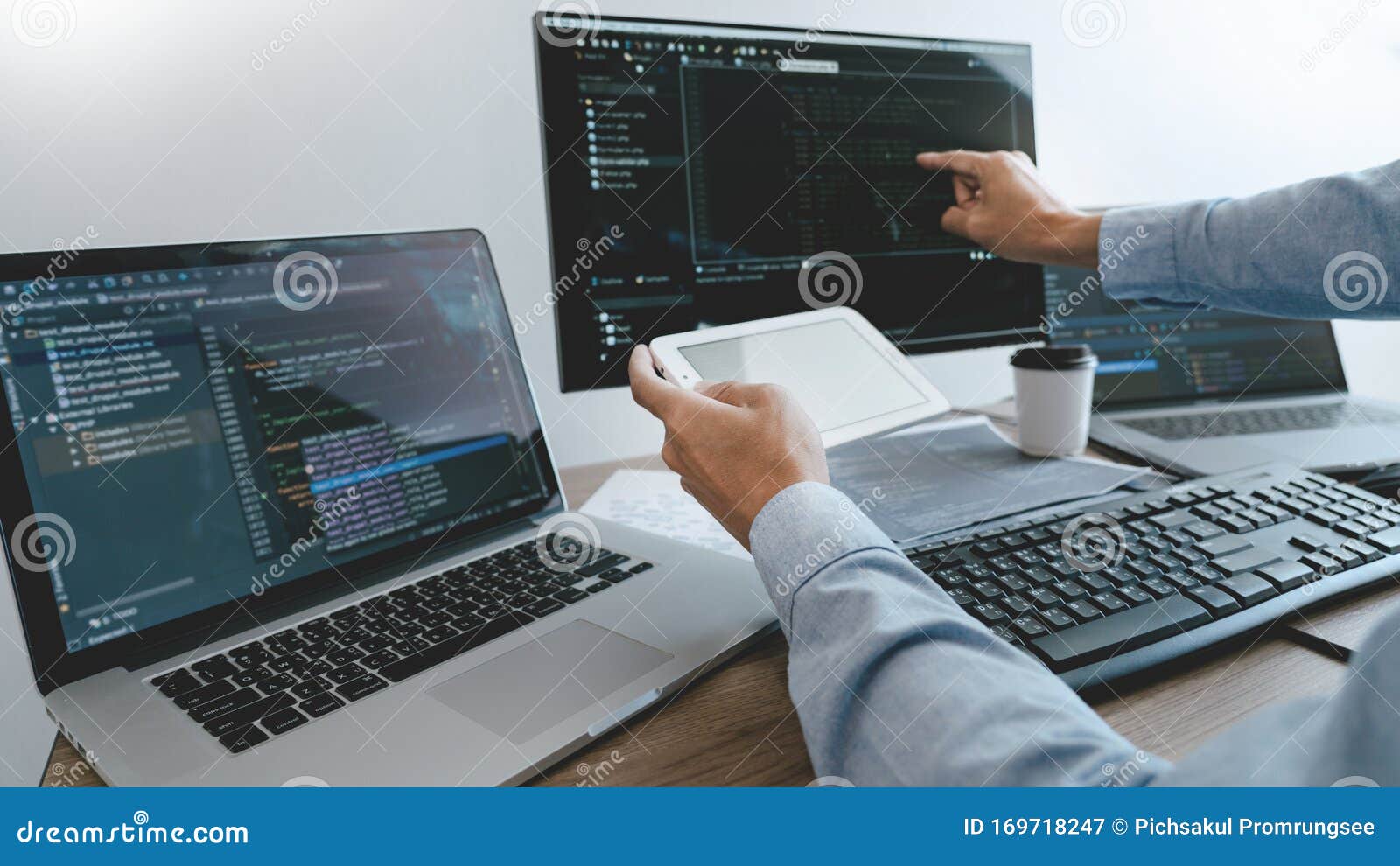 Programmer Working On Computer In It Office Typing Data Coding In Software And Checking Code On