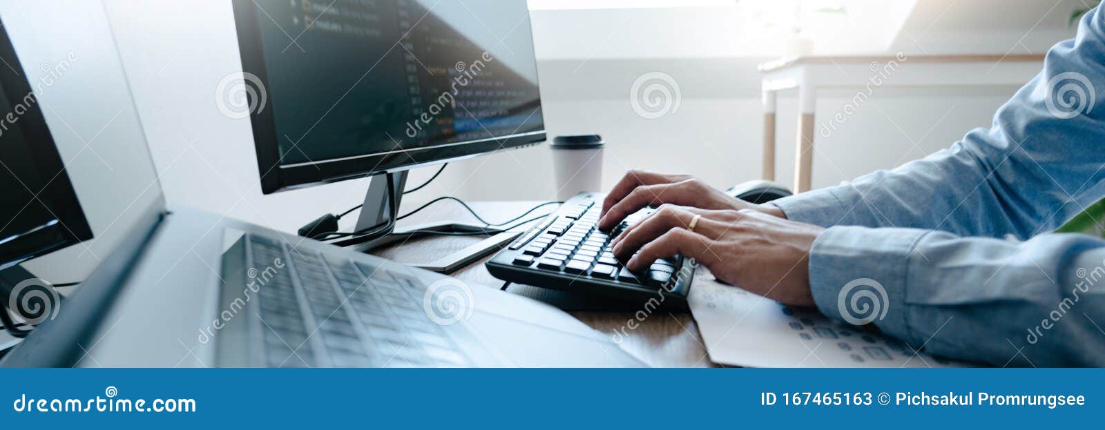 Programmer Working on Computer in it Office Typing Data Coding in ... Programmer Working on Computer in it Office Typing Data Coding in ...